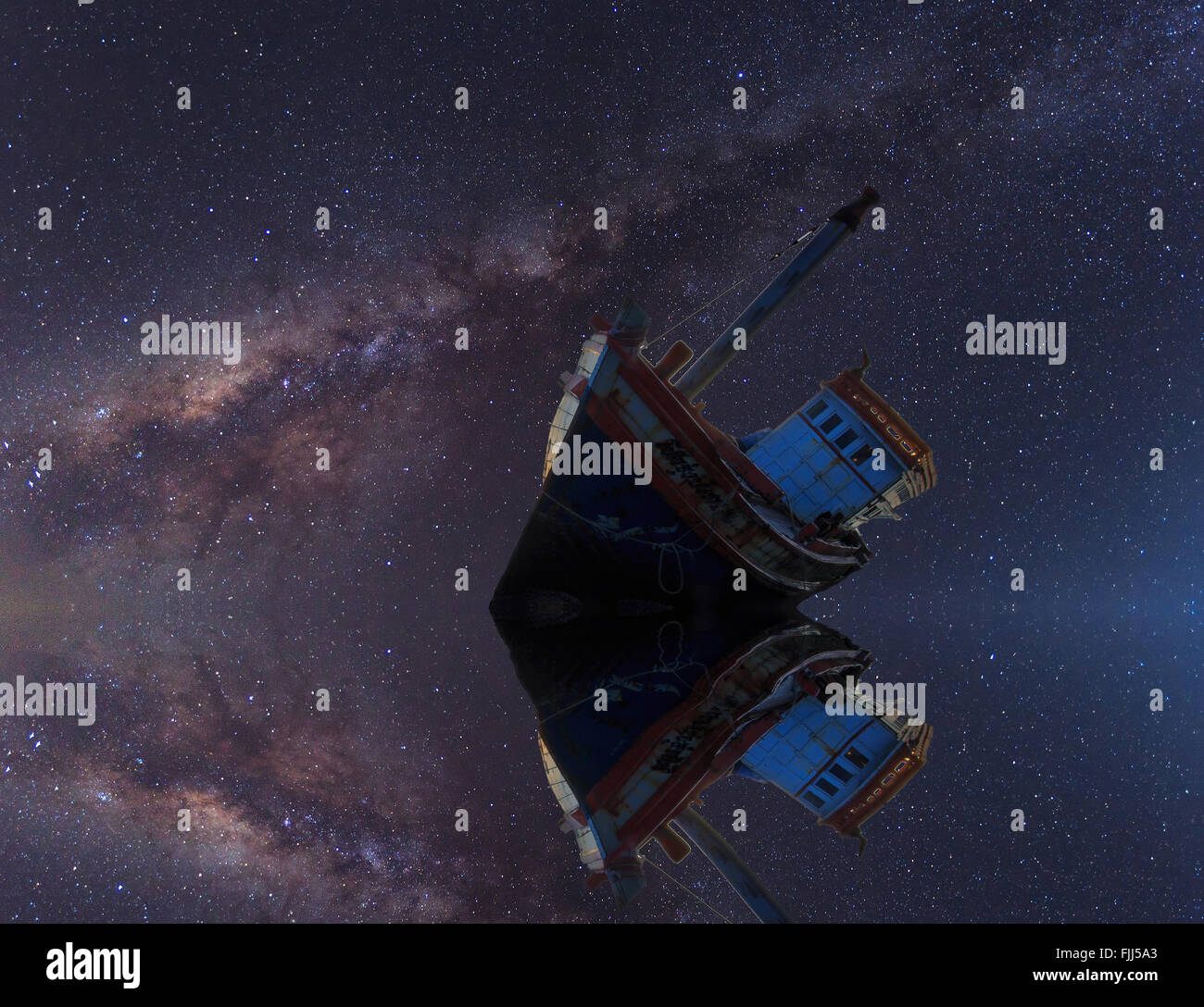 The wrecked ship under starry night with clearly milky way Stock Photo ...