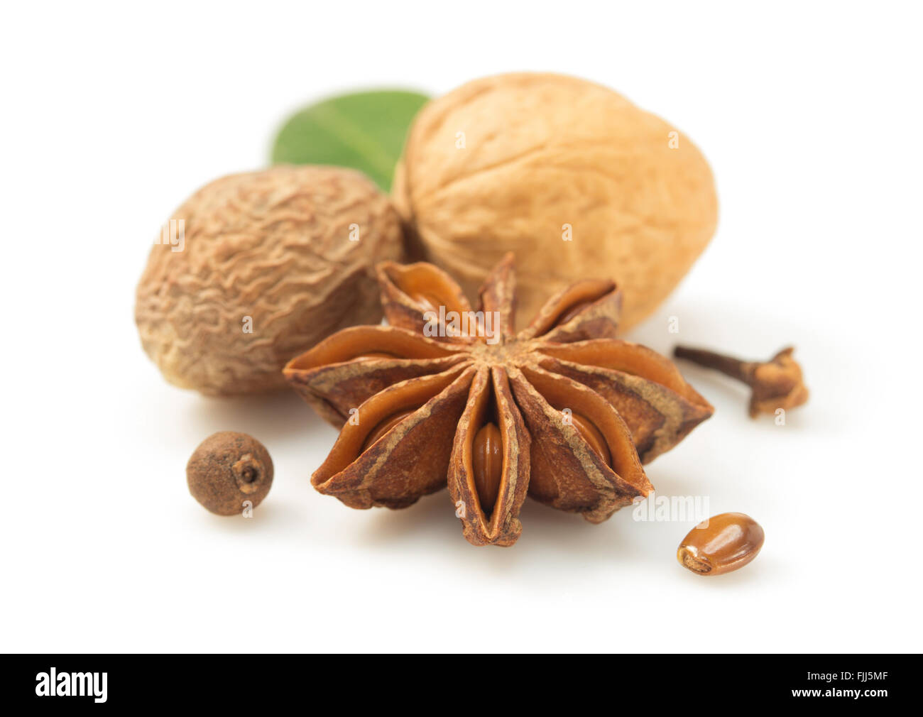 anise star and other spices on white background Stock Photo - Alamy