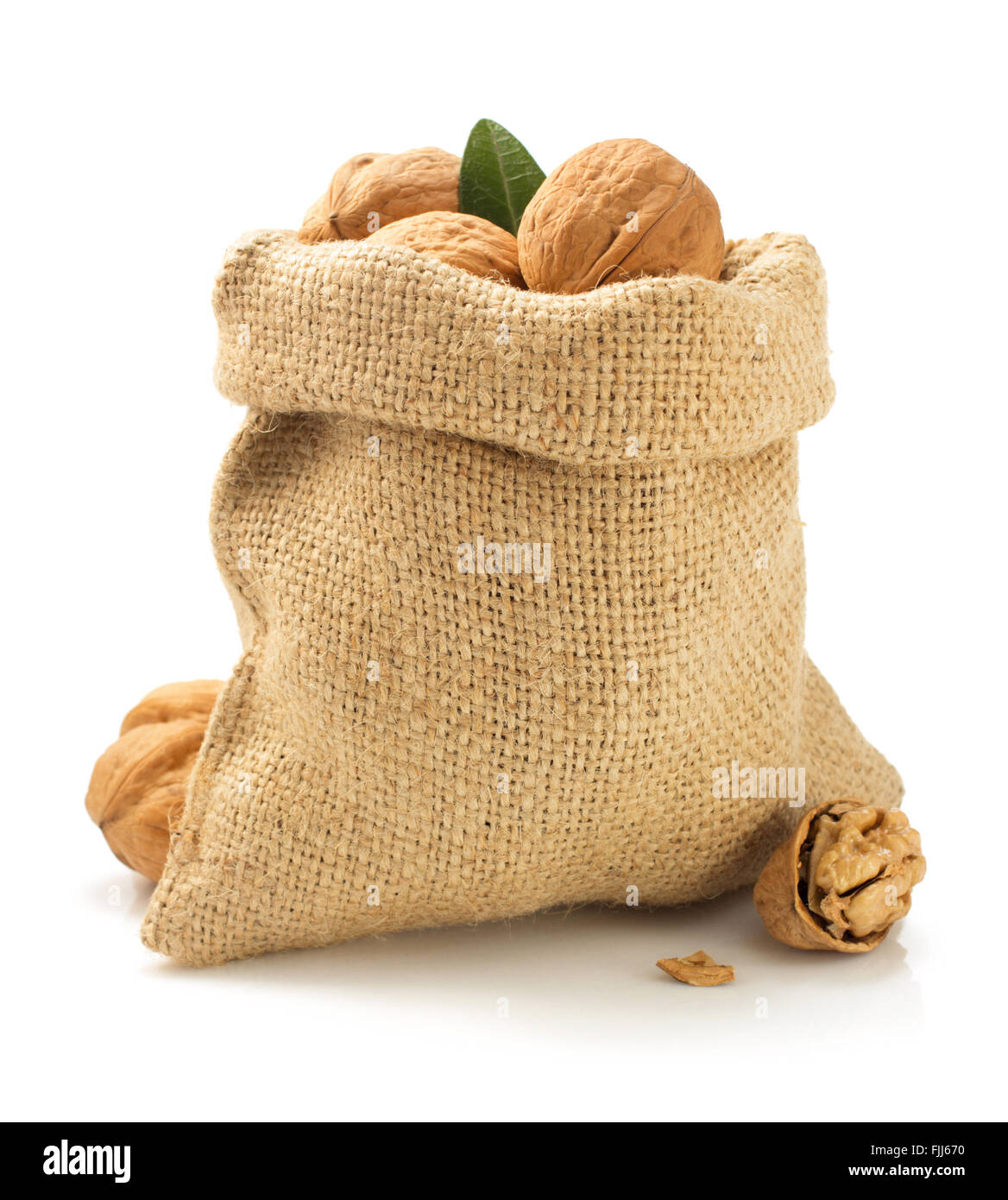 walnuts in bag isolated on white background Stock Photo - Alamy