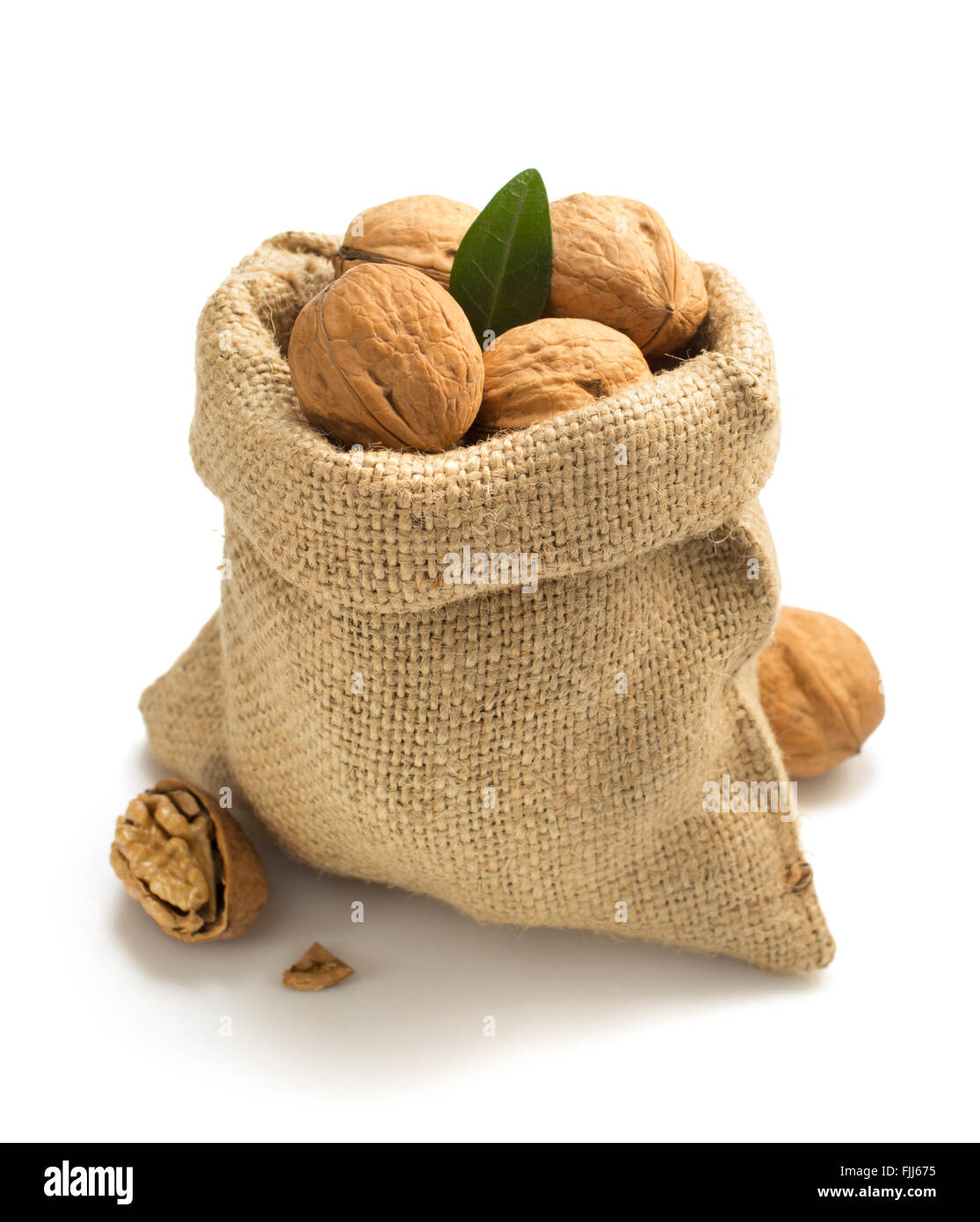 walnuts in bag isolated on white background Stock Photo - Alamy