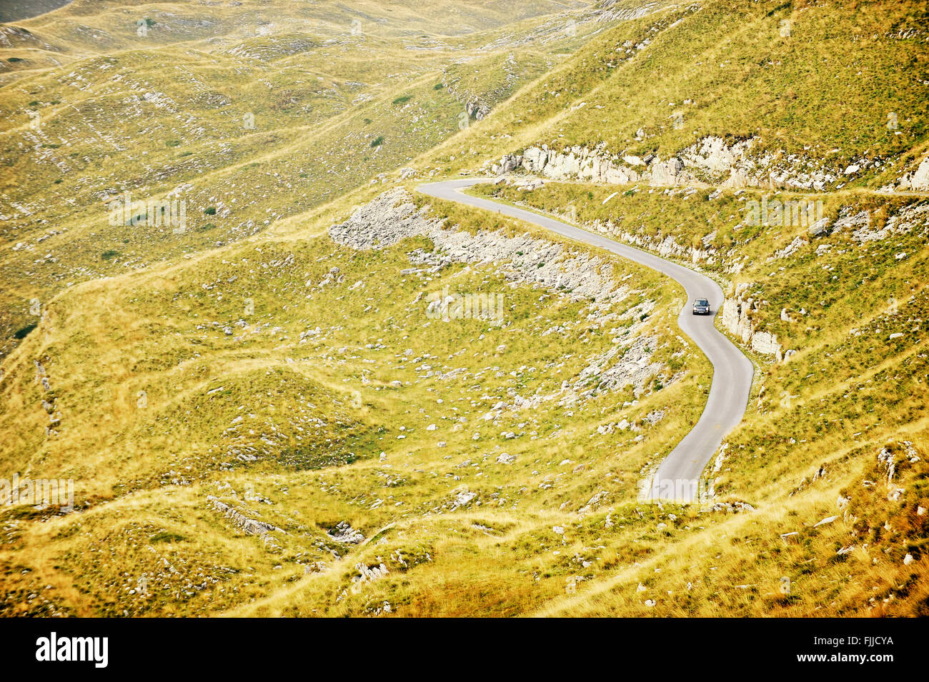 Winding road seen from Sedlo Pass in Durmitor National Park in ...