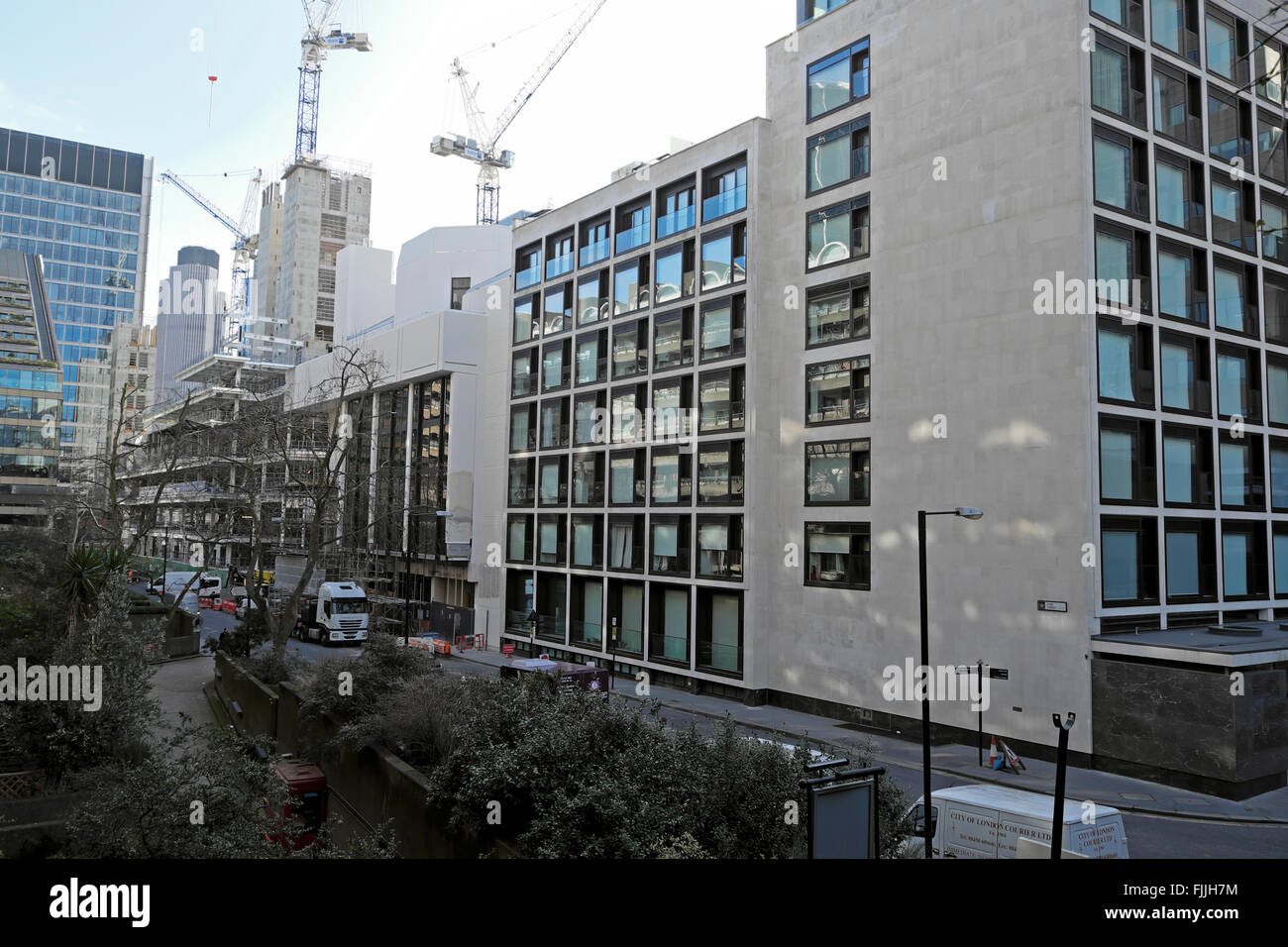 Cranes seen from Fore Street at London Wall Place construction ...