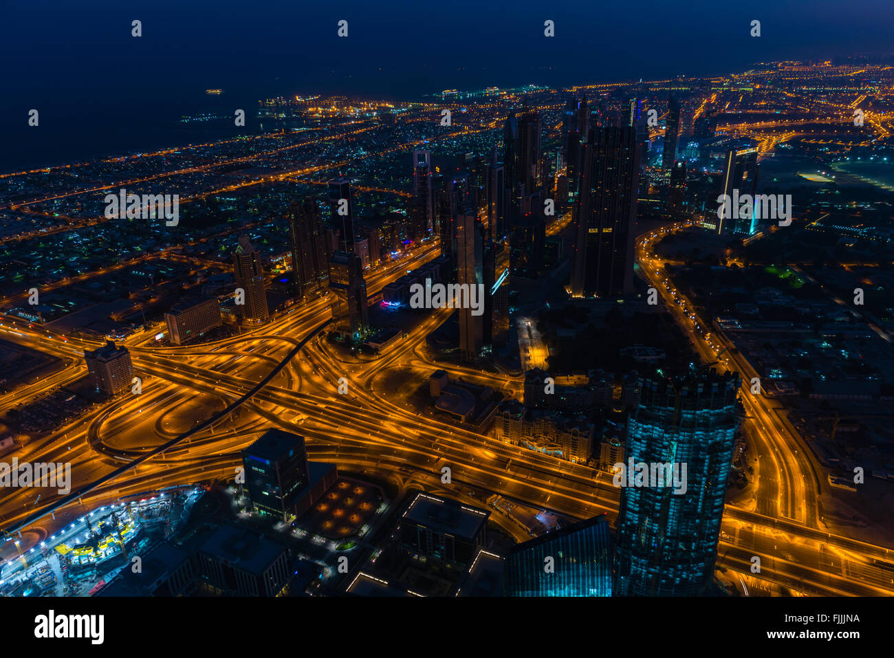 Dubai downtown night scene with city lights. Top view from above Stock ...
