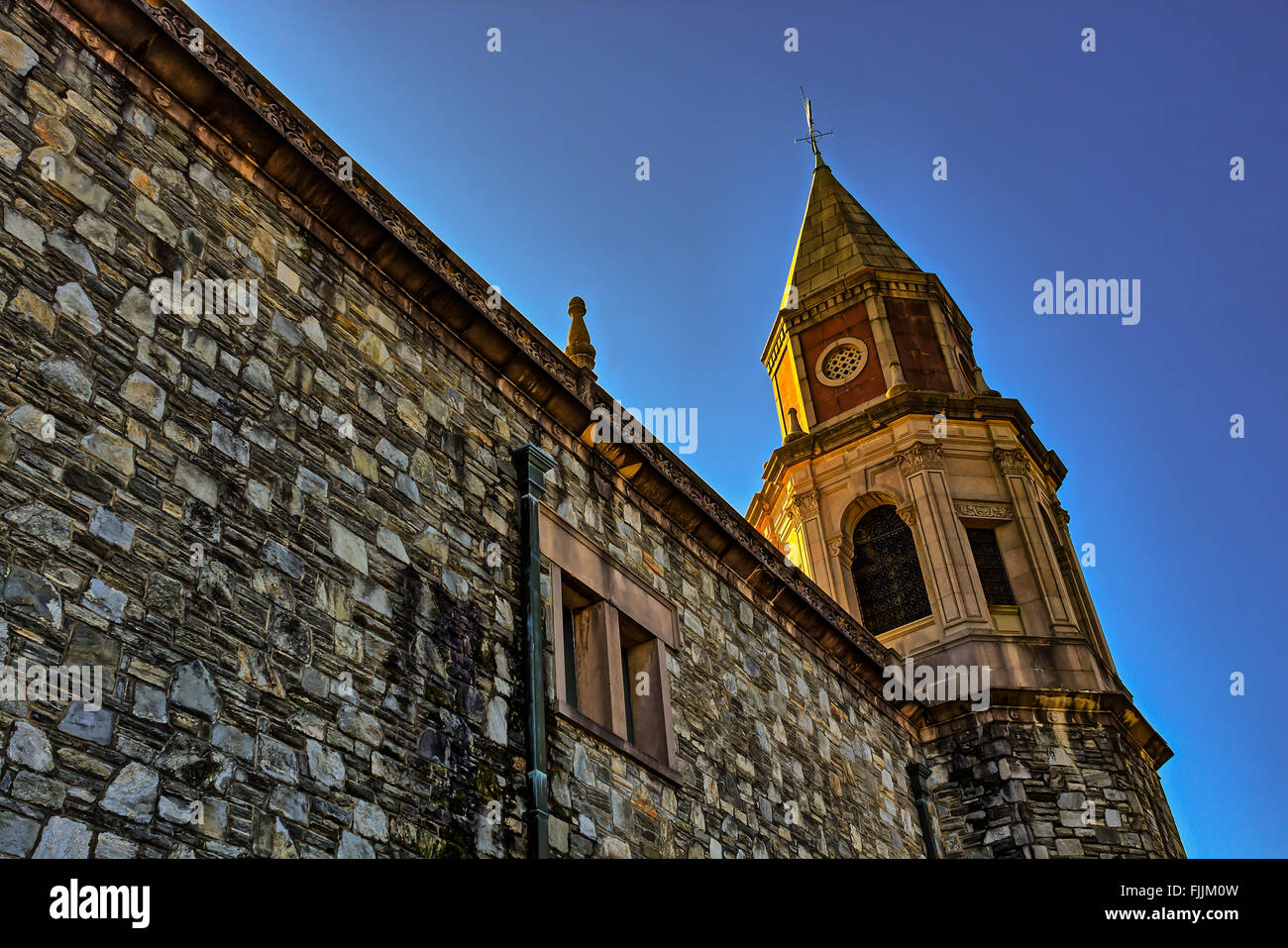 Stone wall with tower Stock Photo - Alamy