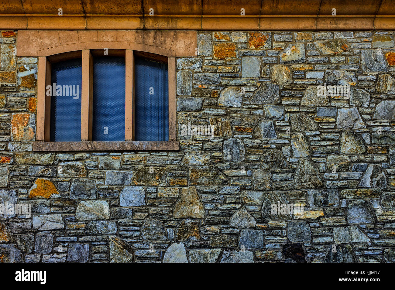 Stone walls with windows Stock Photo - Alamy