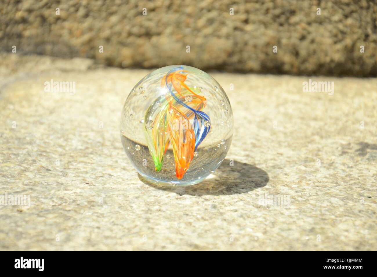 glass ball under the sun light Stock Photo - Alamy