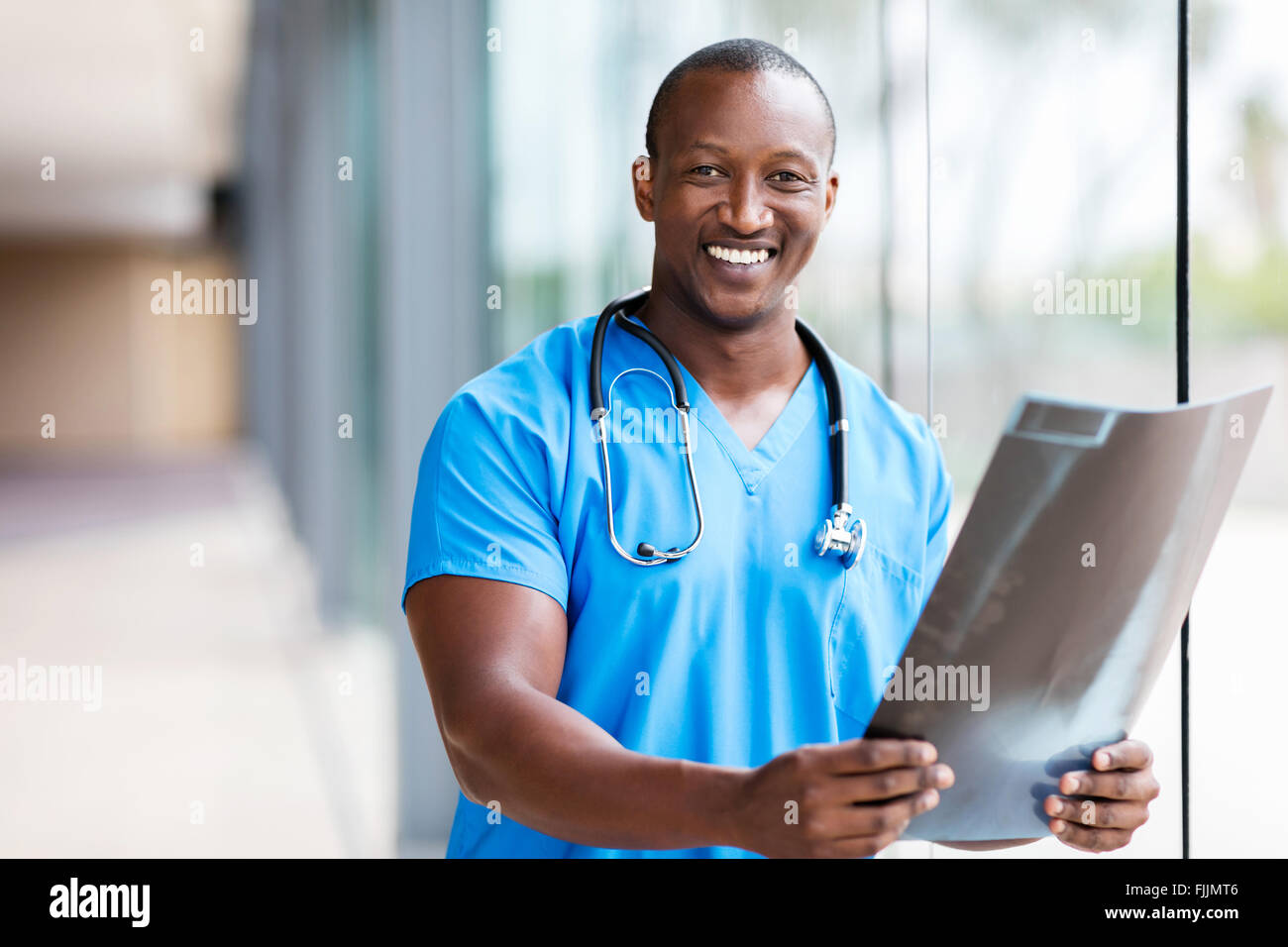 professional African medical doctor holding CT scan Stock Photo - Alamy