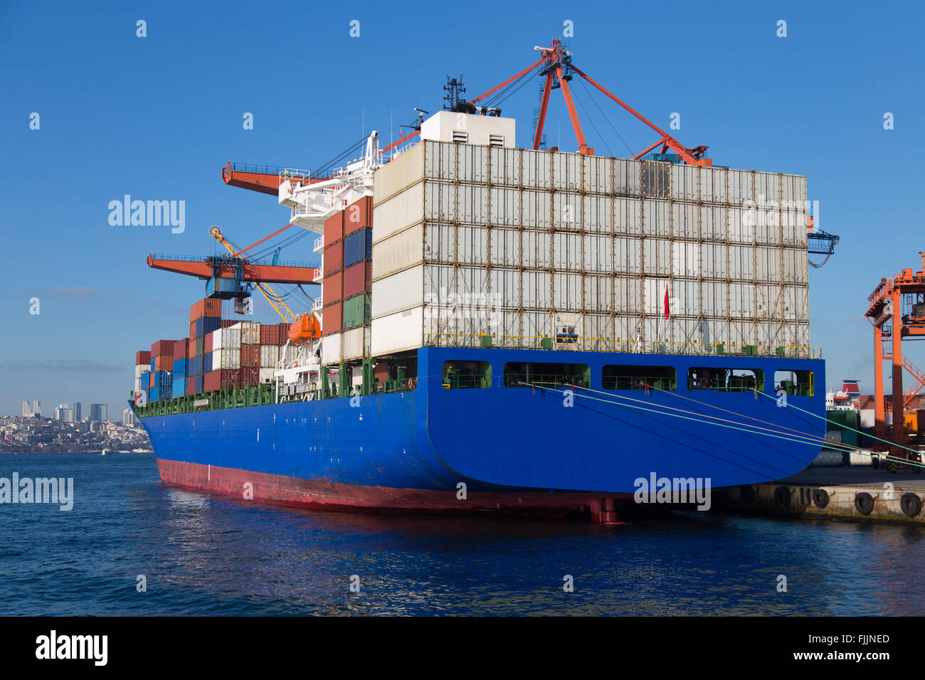 Container Ship is loading in a port Stock Photo - Alamy