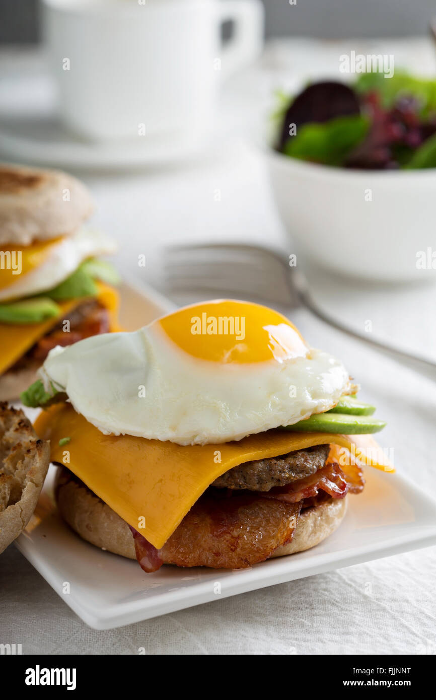 Breakfast burger with avocado, cheese and bacon Stock Photo - Alamy