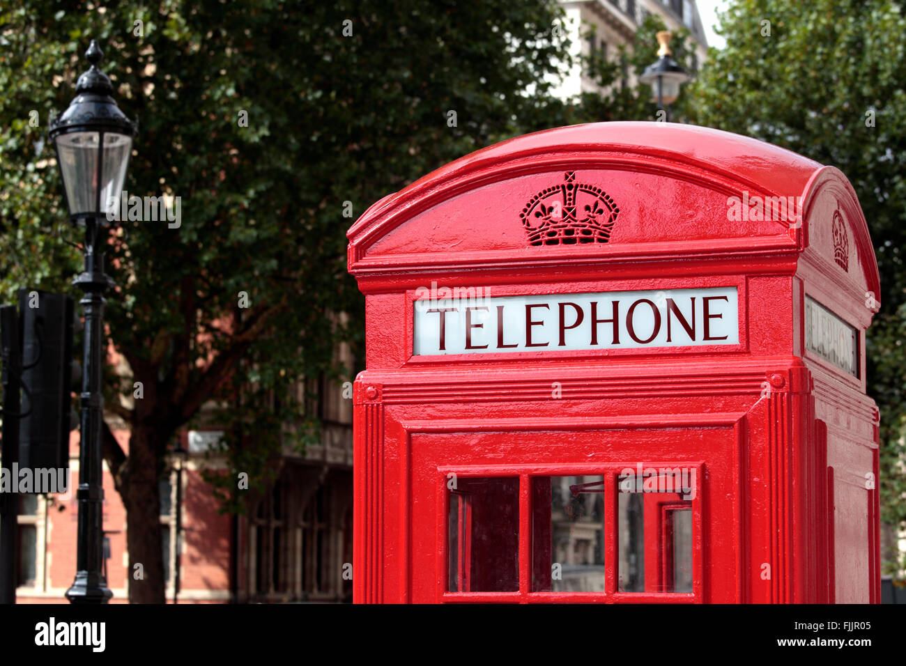 Traditional red telephone box with out of focus background Stock Photo ...