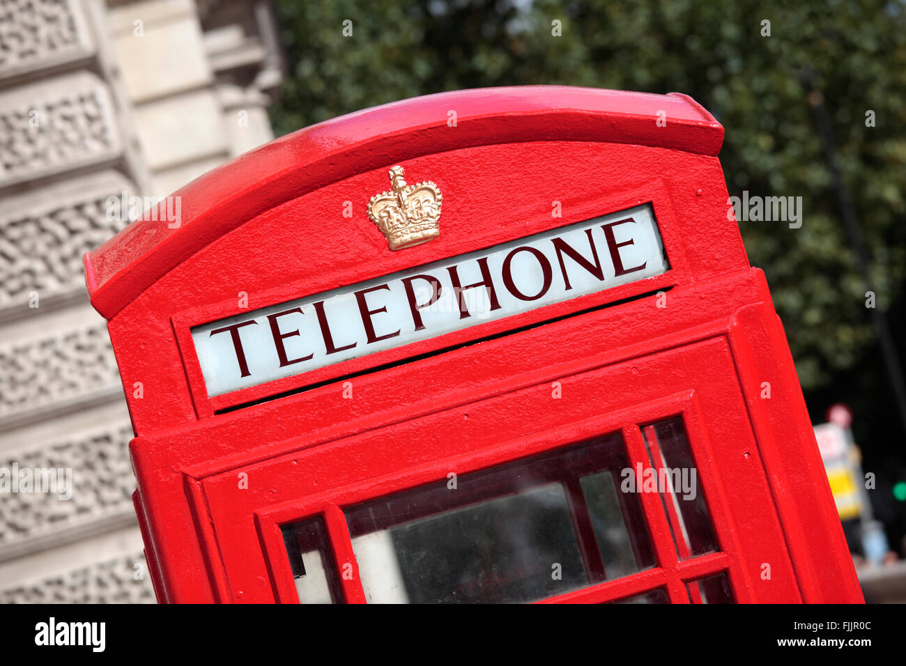 Traditional red telephone box with out of focus background Stock Photo ...