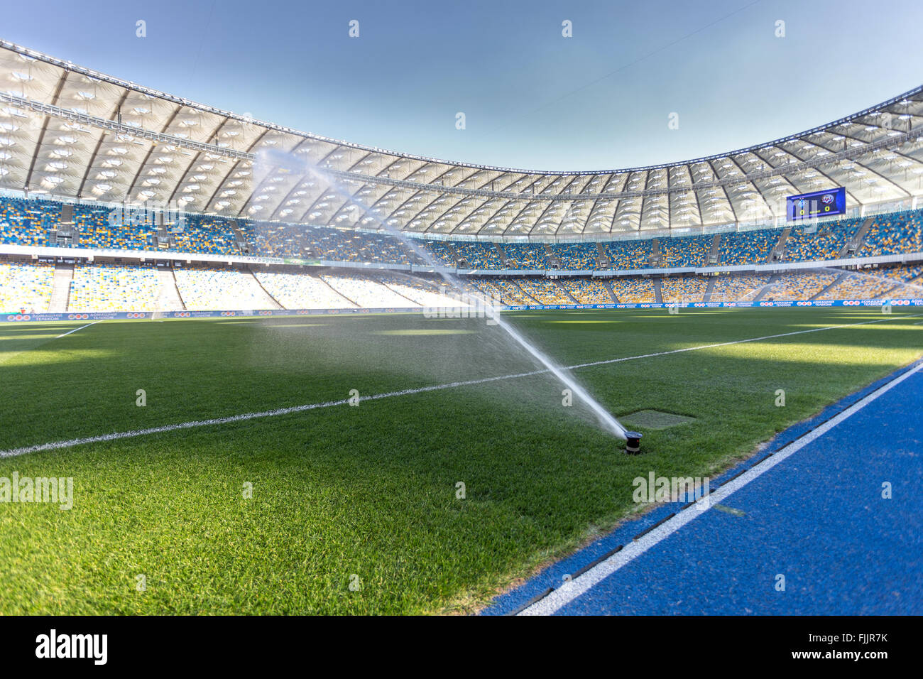 The irrigation system at football field Stock Photo - Alamy
