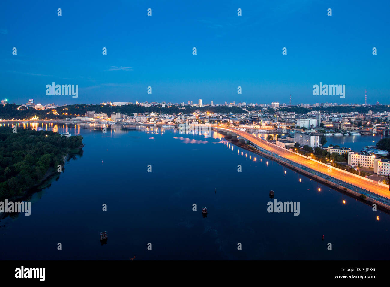 The Evening shot of river bank in the city Stock Photo - Alamy