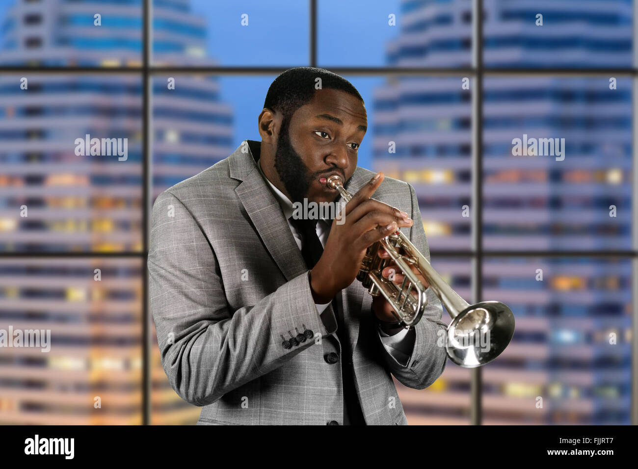 Solo performance professional trumpeter in hi-res stock photography and ...