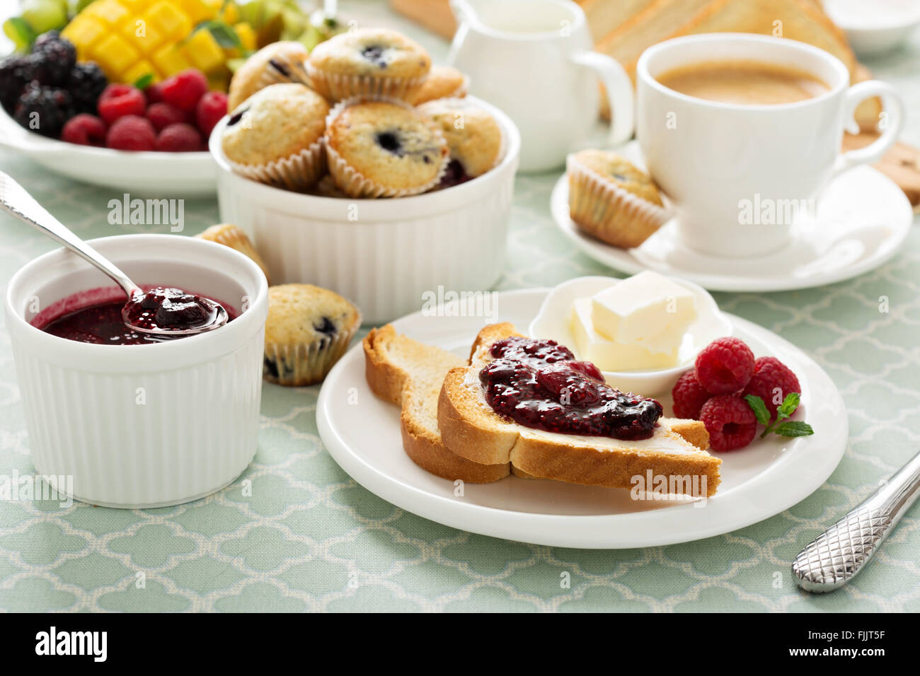 Fresh and bright continental breakfast table Stock Photo - Alamy