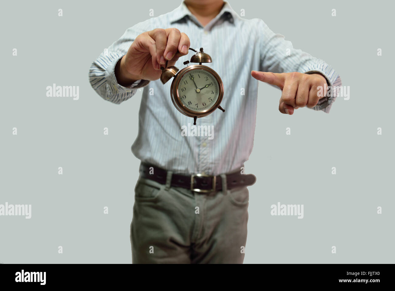 A man take a clock Stock Photo - Alamy
