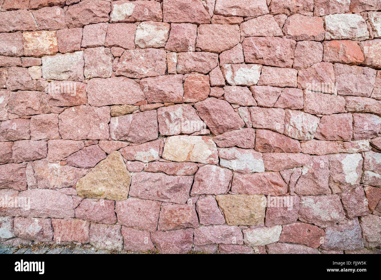 wall of reddish stones Stock Photo - Alamy