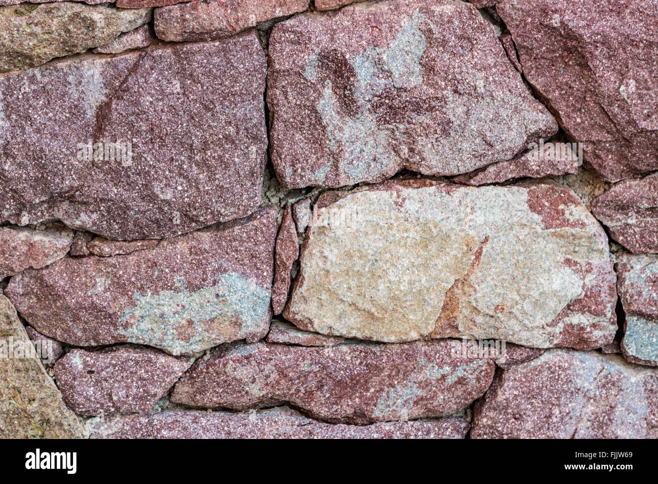 wall of reddish stones Stock Photo - Alamy