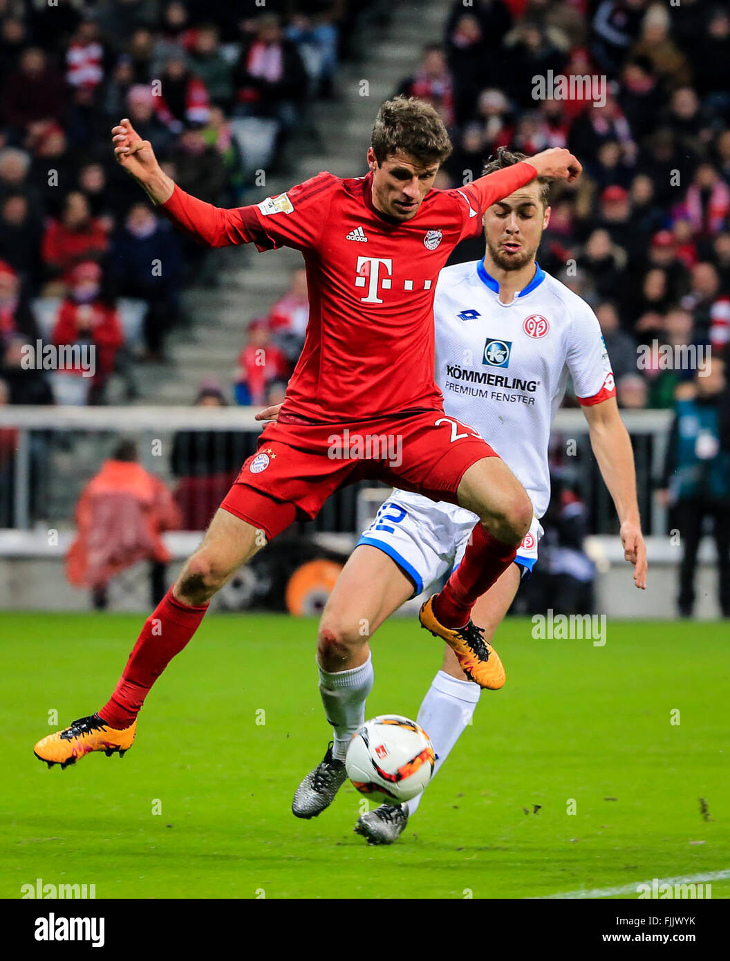 Munich, Germany. 2nd Mar, 2016. Thomas Mueller (Front) of Bayern Munich ...