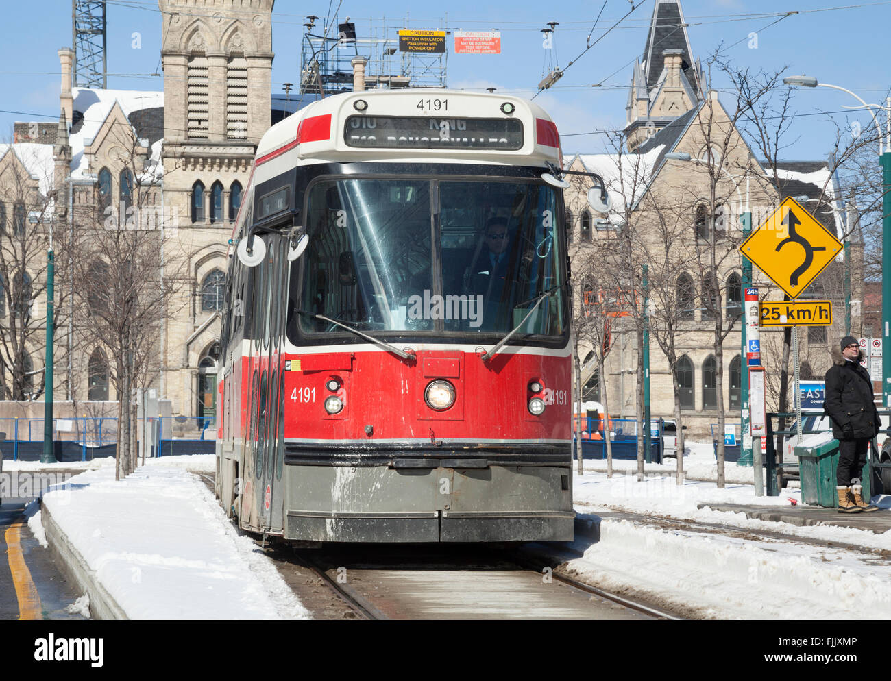 Street car of the Toronto Transit Commission travels through down town ...