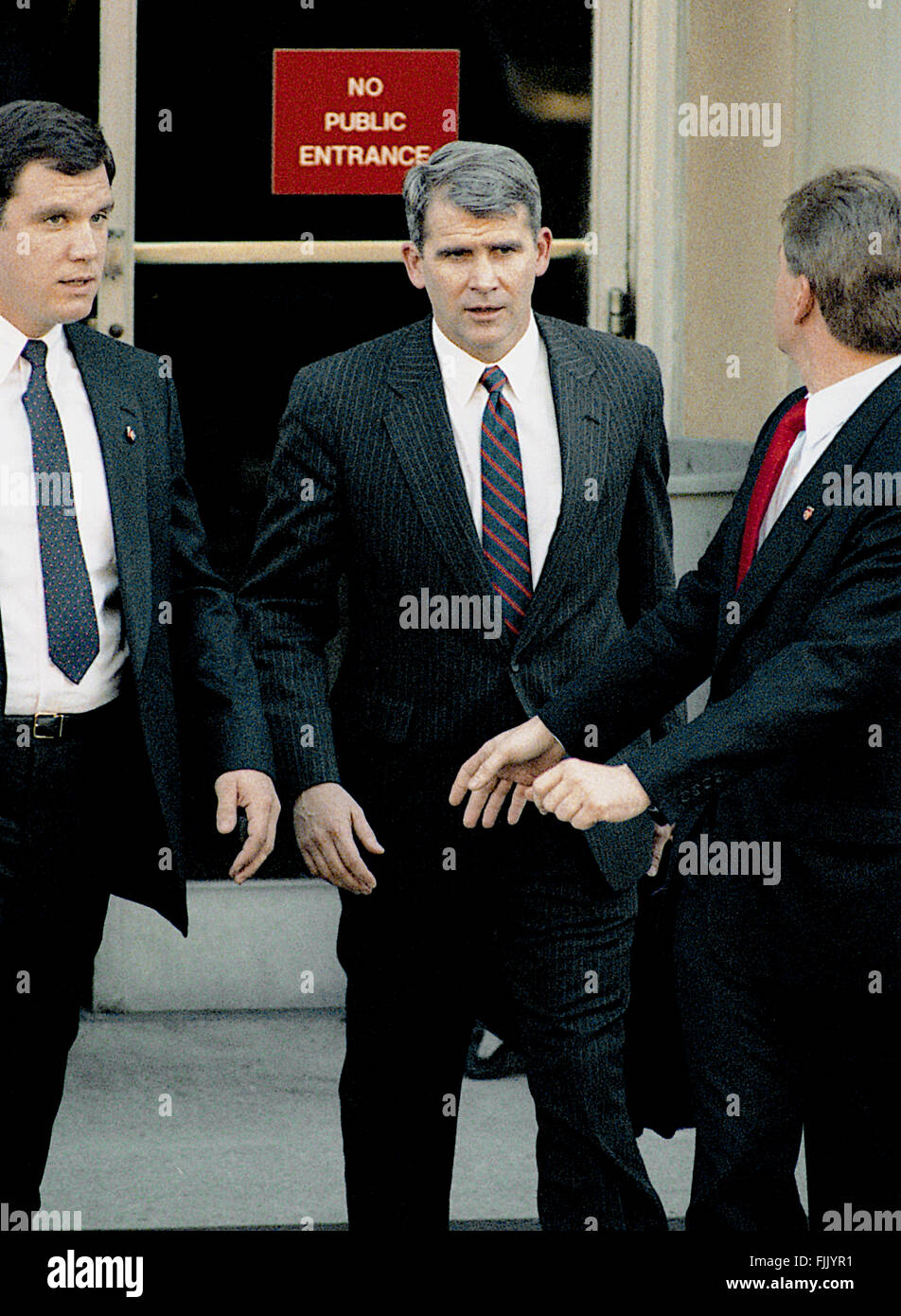 Washington, DC., October, 1987 Lt. Colonel Oliver North departs from ...