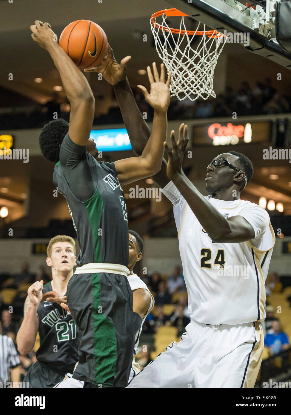 Orlando, FL, USA. 2nd Mar, 2016. UCF center Tacko Fall (24) defends Tulane forward Blake Paul ...
