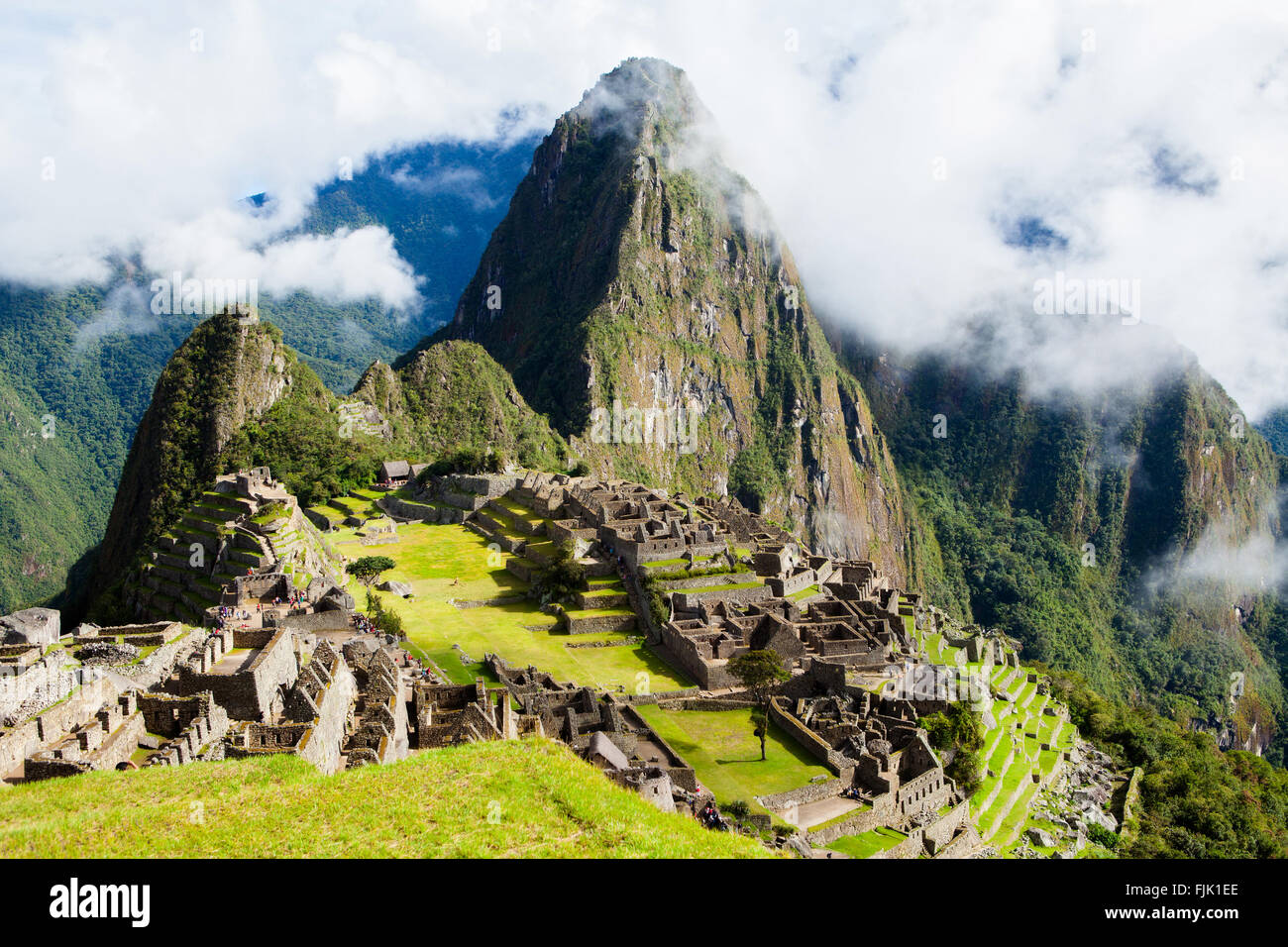 Misty clouds over Machu Picchu Peru Stock Photo - Alamy
