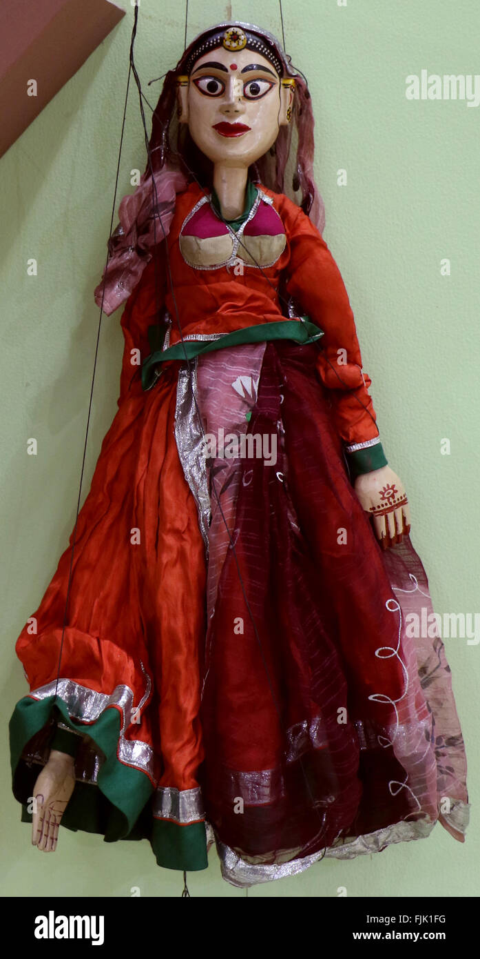 Colorful puppet hanging in a shop in Surajkund public craft fair Stock ...