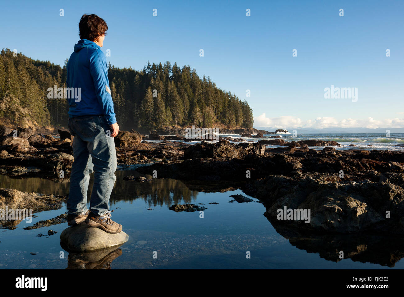 Person on rock at Sombrio Beach - Juan de Fuca Provincial Park ...