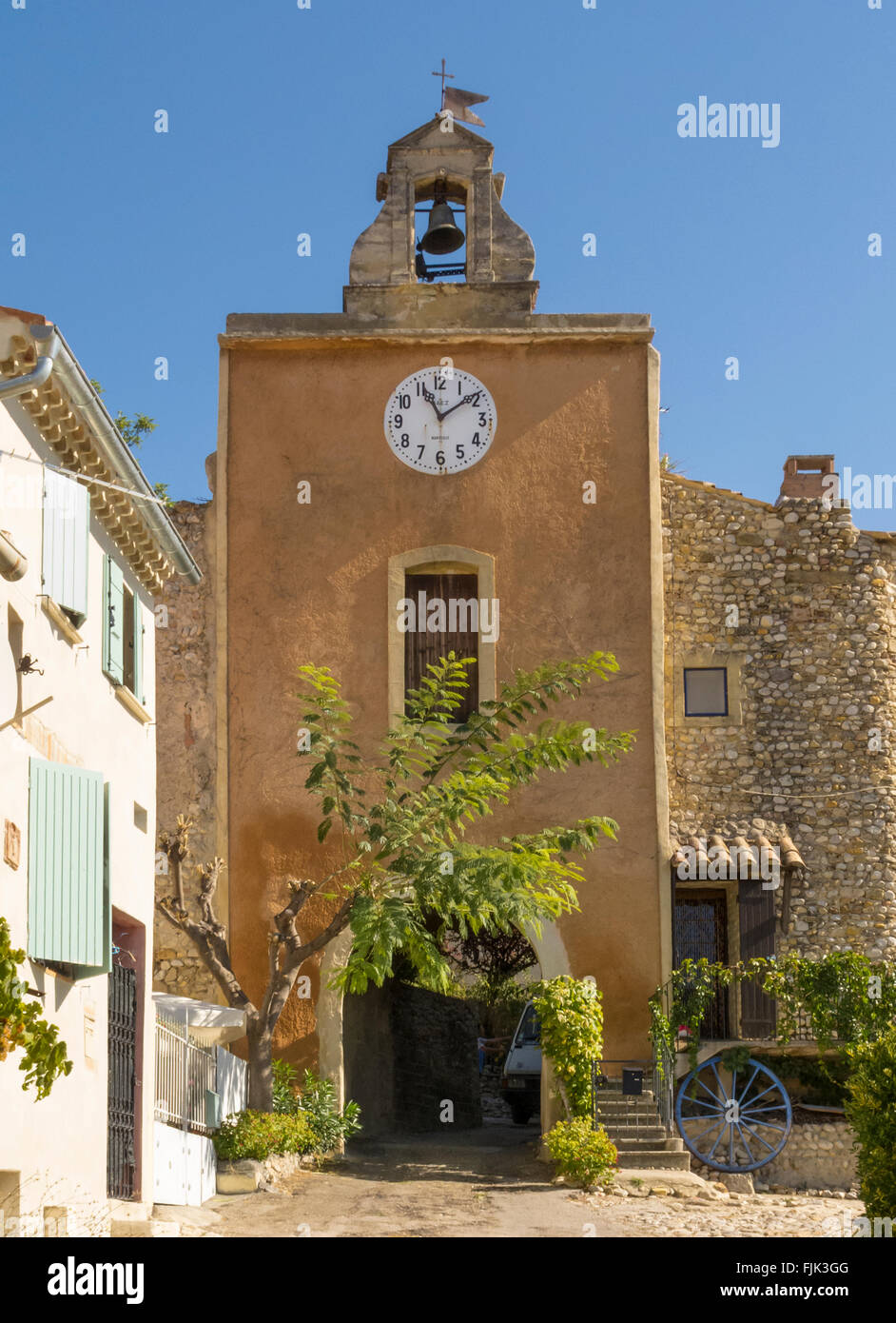 Old clock and bell tower, gateway to the historic Medieval village of ...