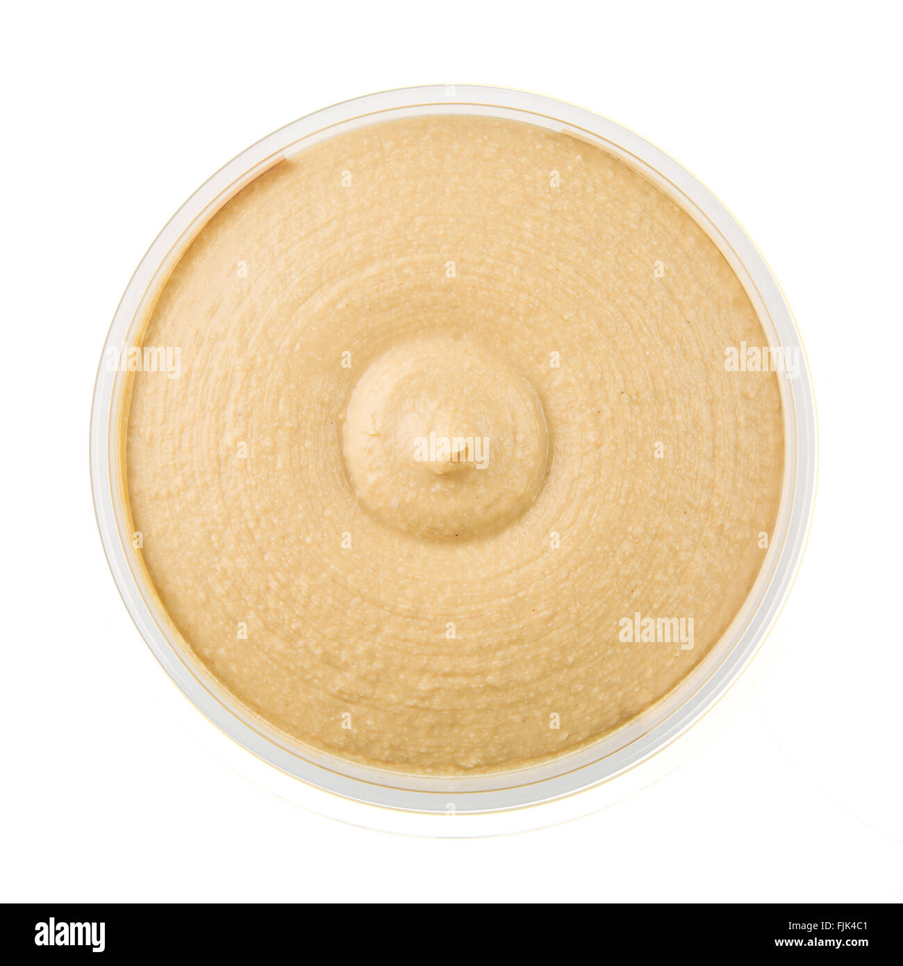 Healthy hummus in container from above and isolated on a white ...