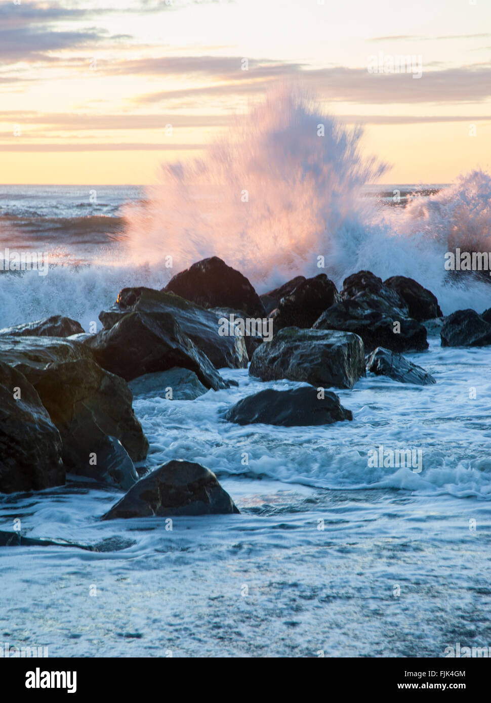 Crashing waves with people hi-res stock photography and images - Alamy