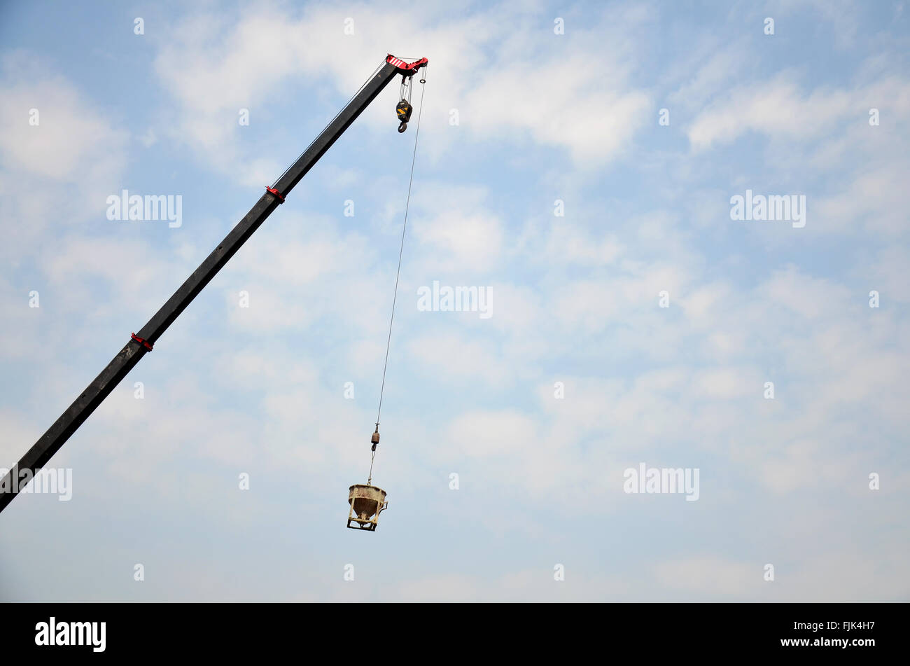 Crane lifting cement container construction hi-res stock photography ...