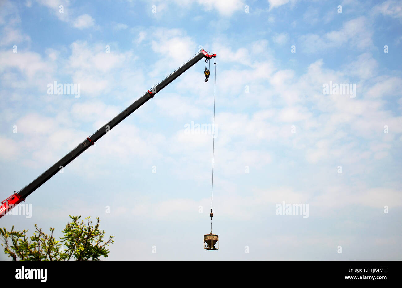 Crane lifting cement container construction hi-res stock photography ...