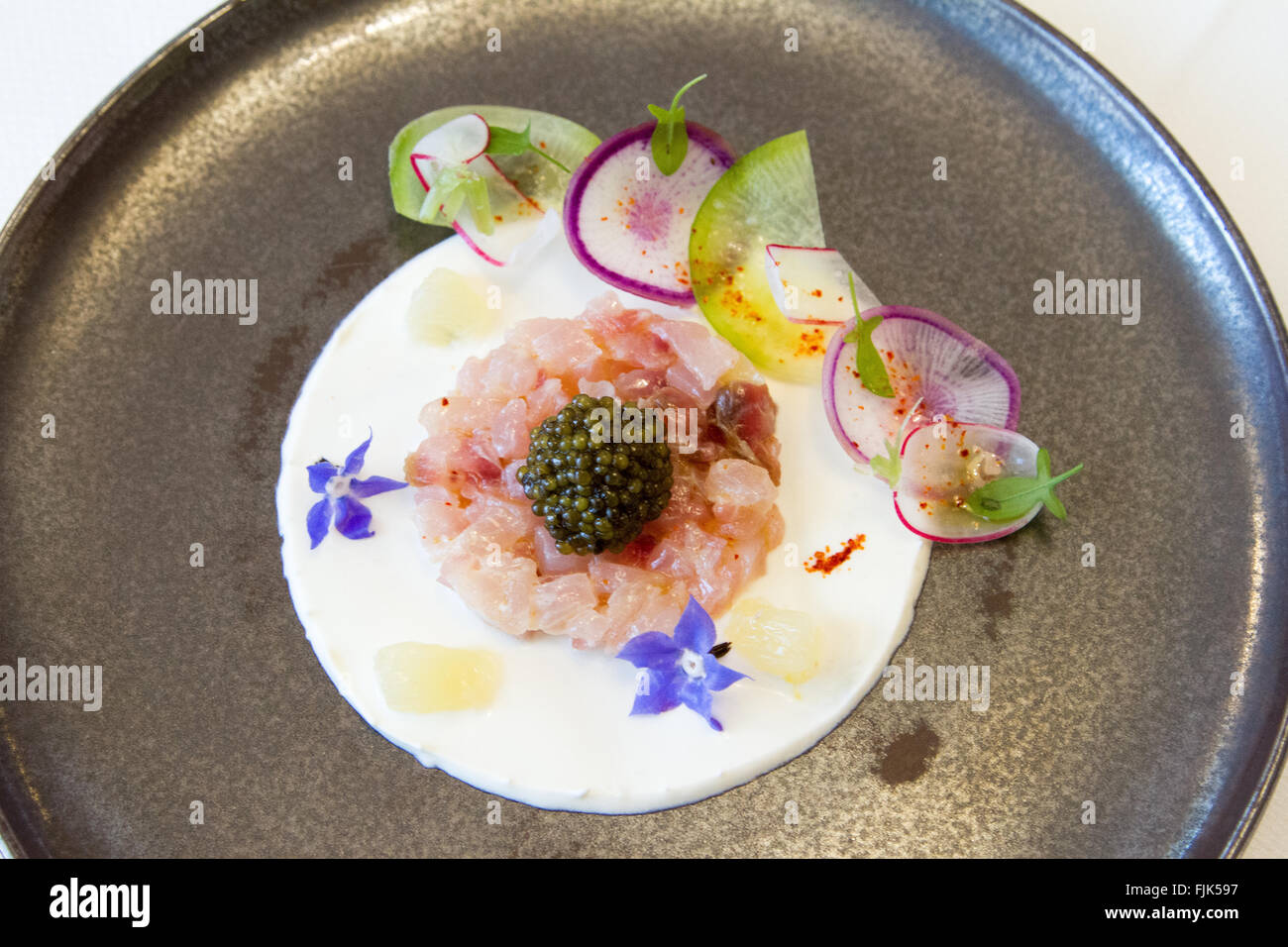 Fish tartar with caviar Stock Photo - Alamy