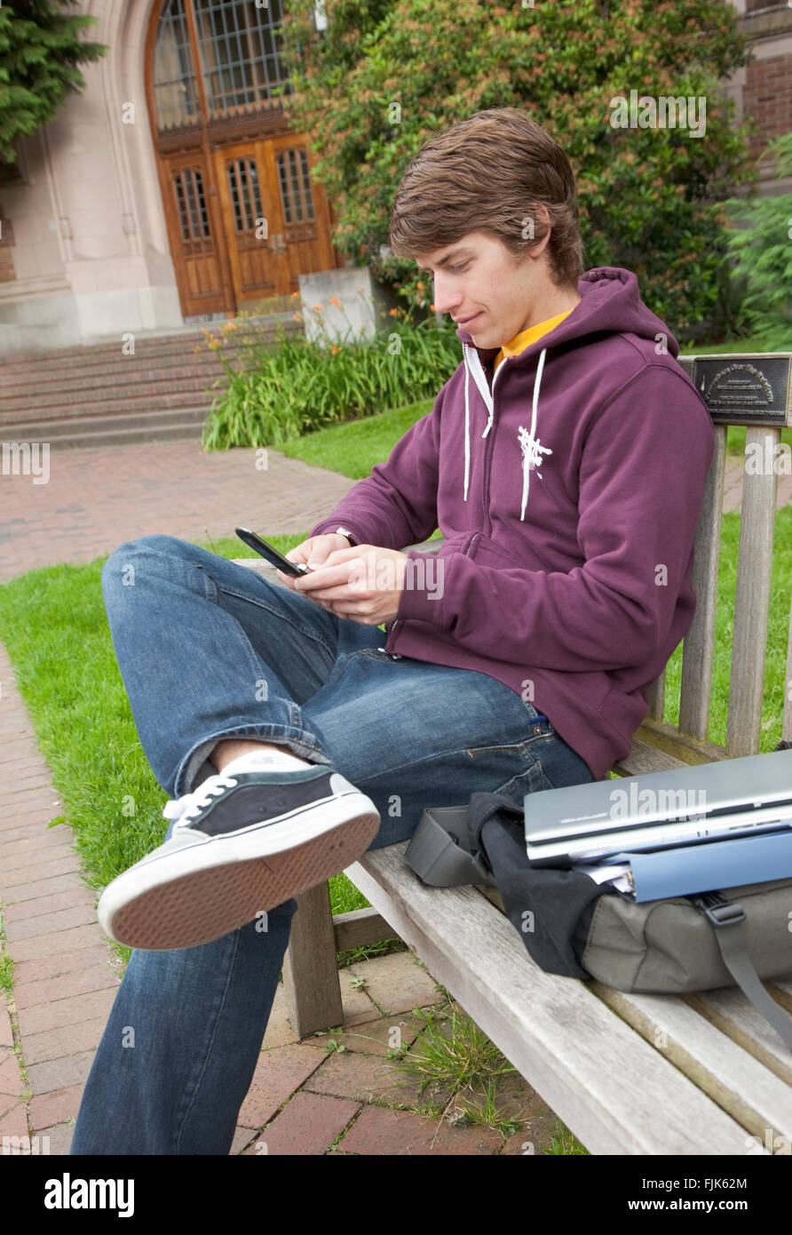 University male cell phone hi-res stock photography and images - Alamy