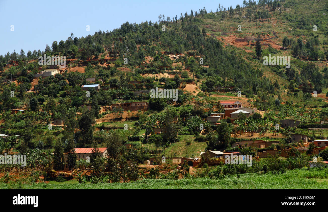 Country homes in Rwanda built into the hills Stock Photo - Alamy