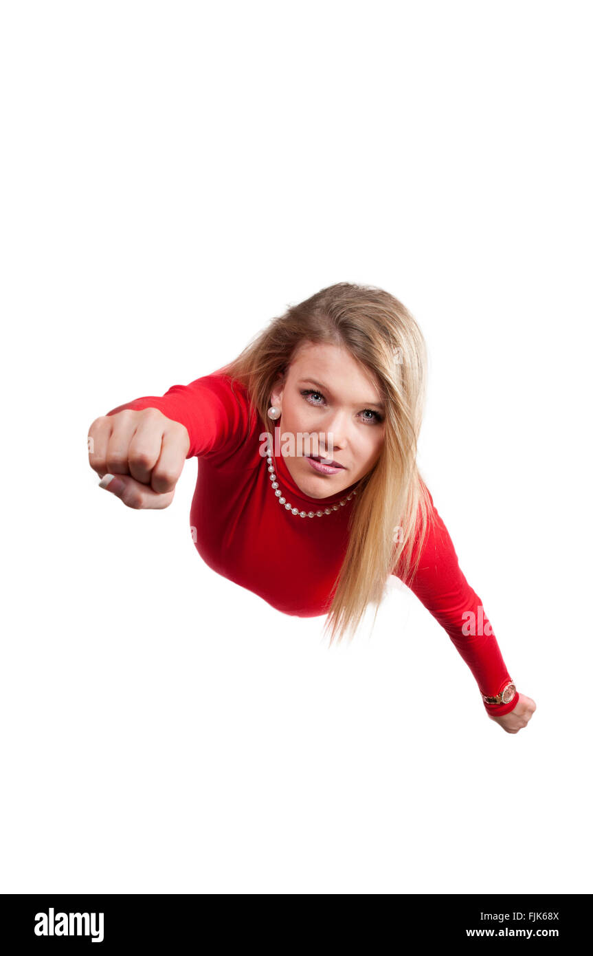 Beautiful young woman flying through the sky Stock Photo - Alamy
