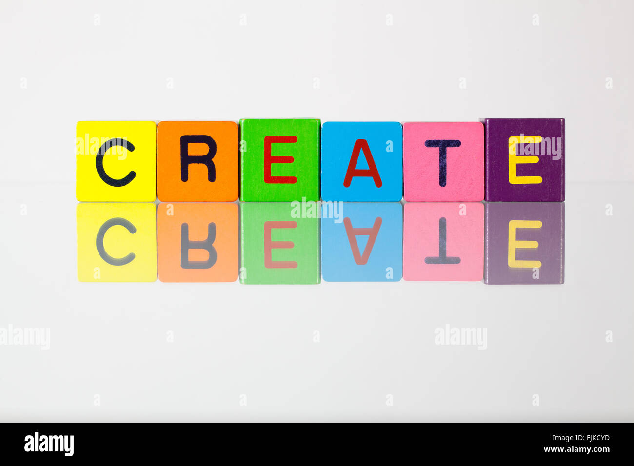 Create - an inscription from children's wooden blocks Stock Photo - Alamy