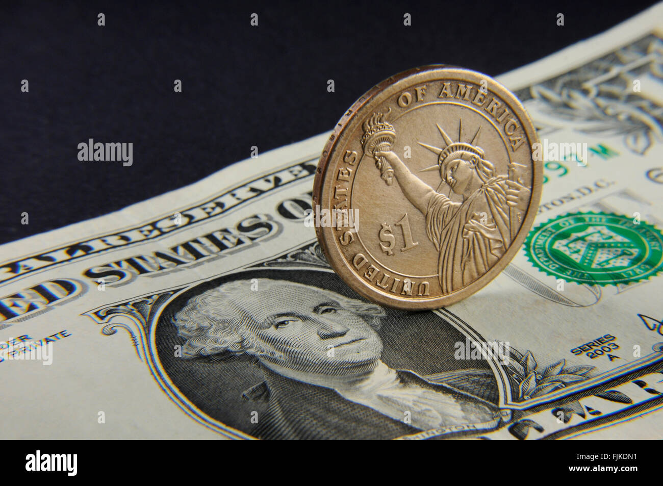 American Dollar note and coin Stock Photo - Alamy