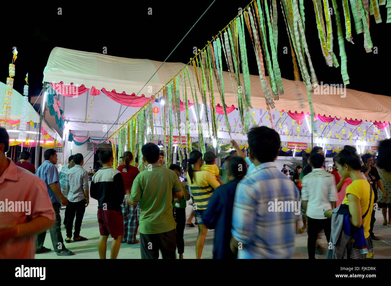 People join Kathin merit ceremony and praying with buddha statue at Wat ...