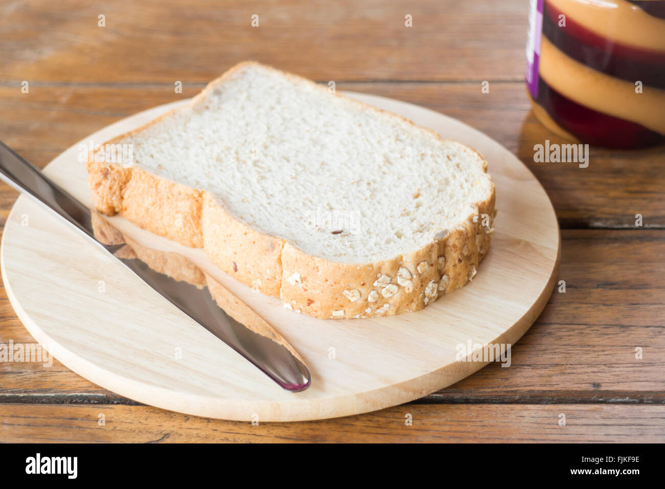 Whole grain bread on wooden plate, stock photo Stock Photo - Alamy