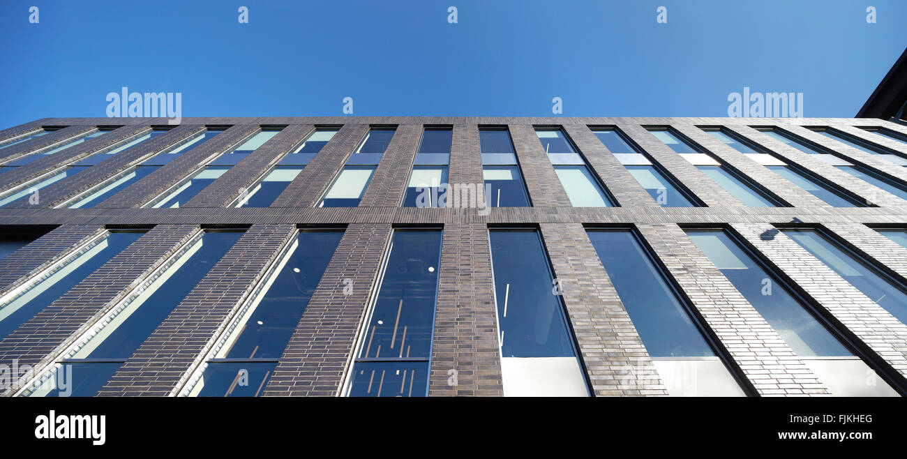 Facade viewed from below. MMU Student Union, Manchester, United Kingdom ...