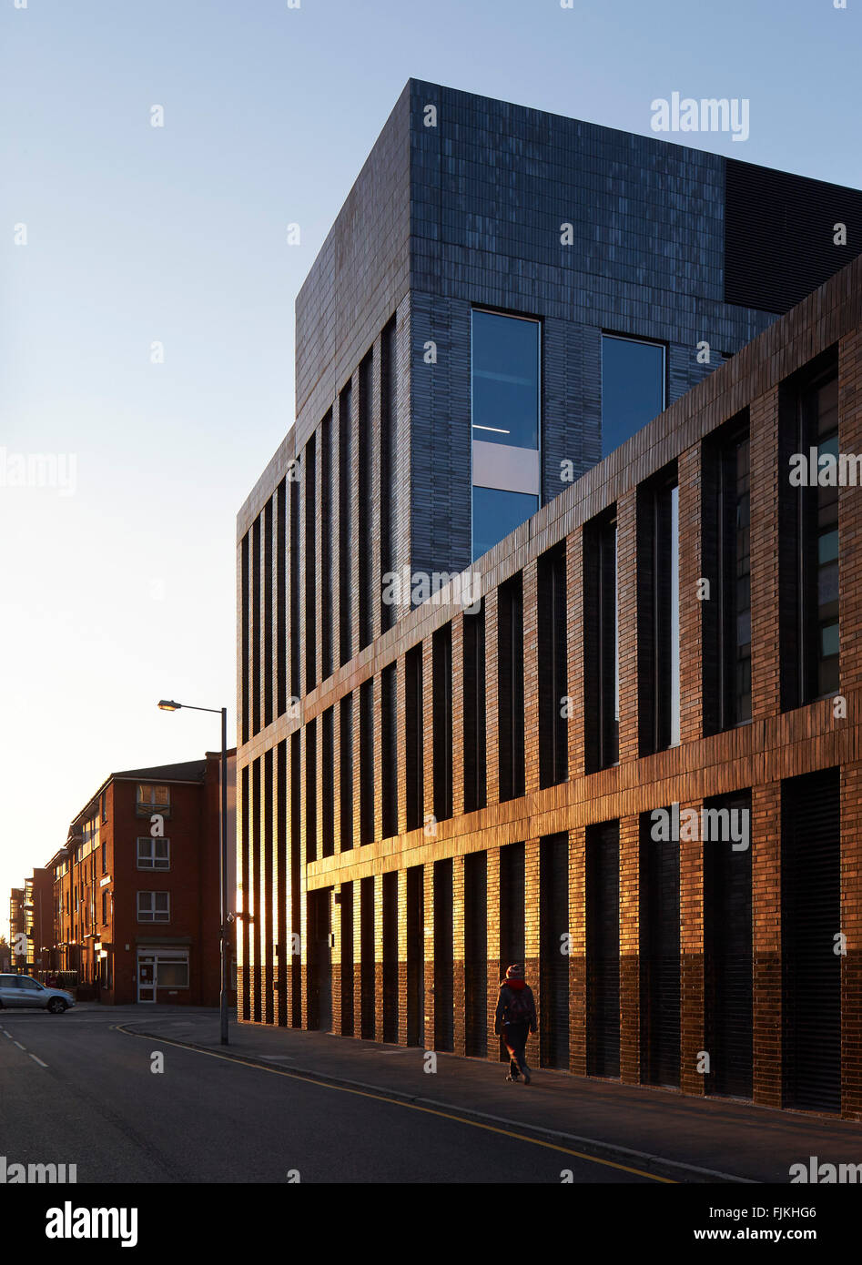 Facade perspective glowing in morning light. MMU Student Union ...