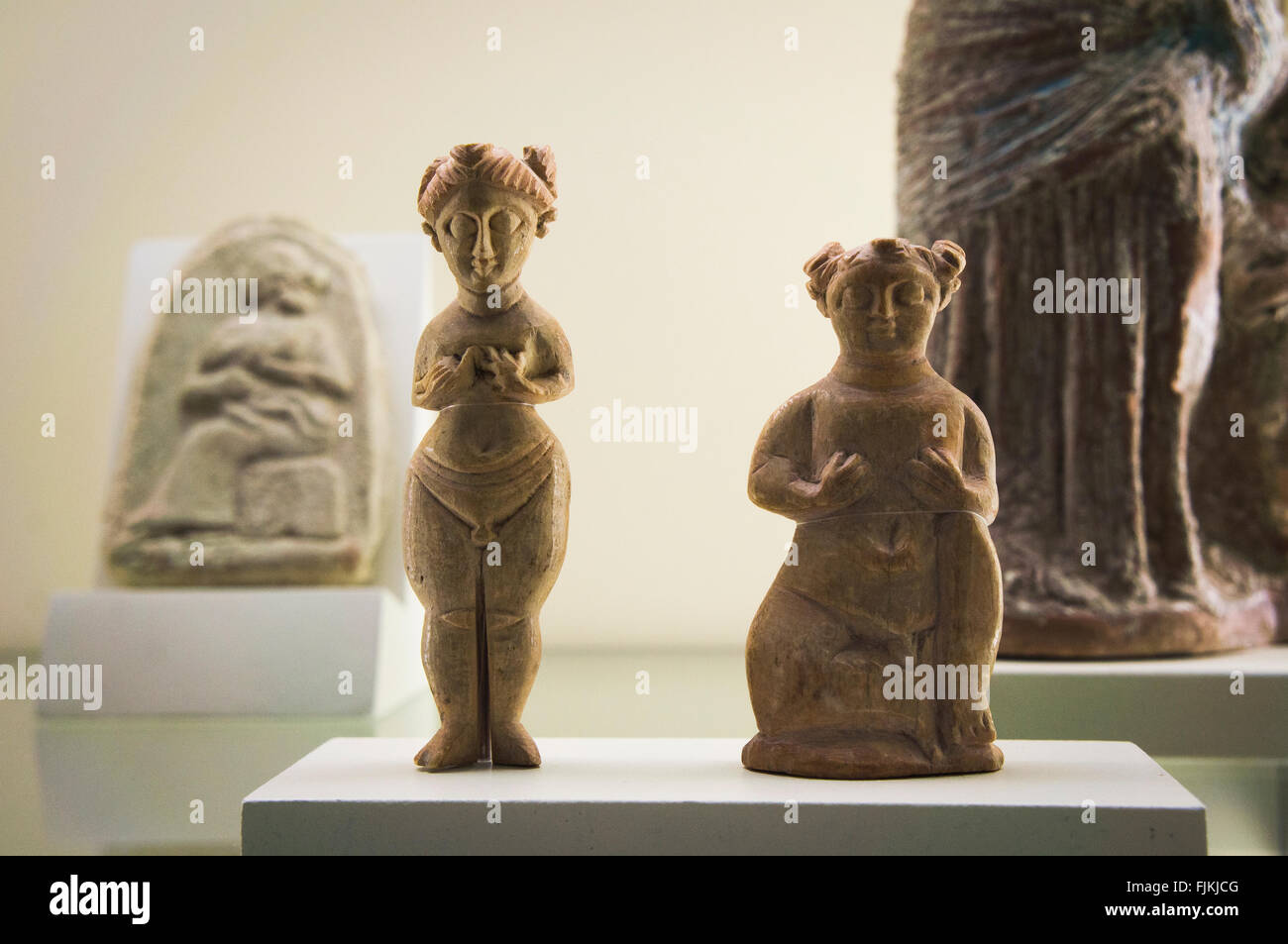 bone figures, woman and sitting boy, Pergamon Museum Stock Photo - Alamy