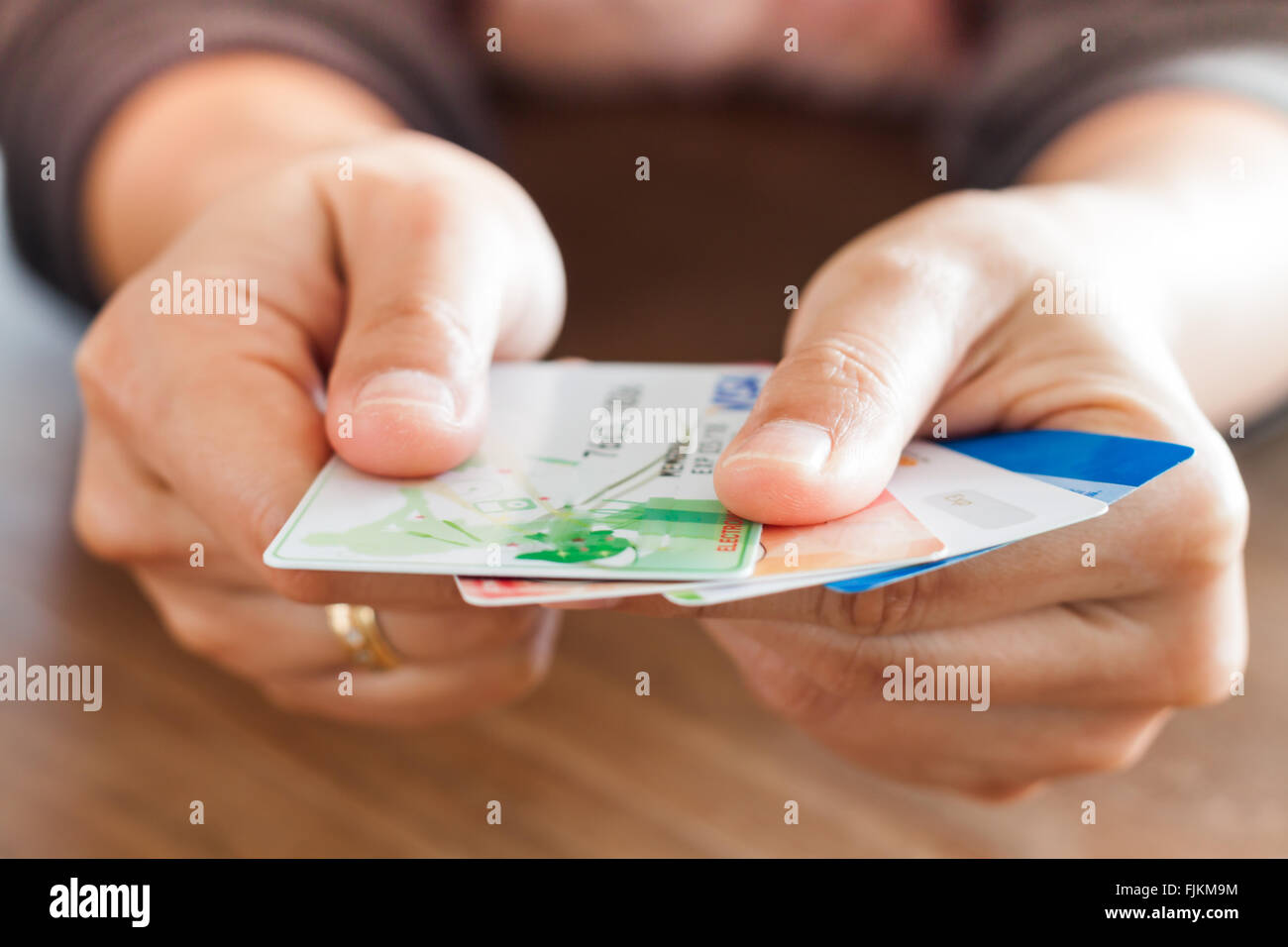 Visa card and hand hi-res stock photography and images - Alamy