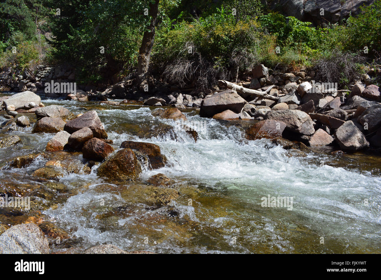 River Water Flows Over Rocks Stock Photo - Alamy