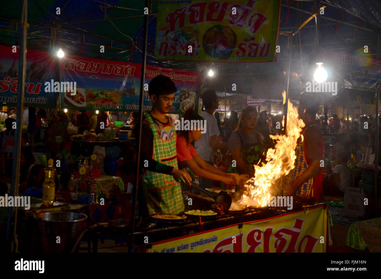 Thai people cooking Fried mussel with egg and crispy flour or Oyster omelette for sale people in ...