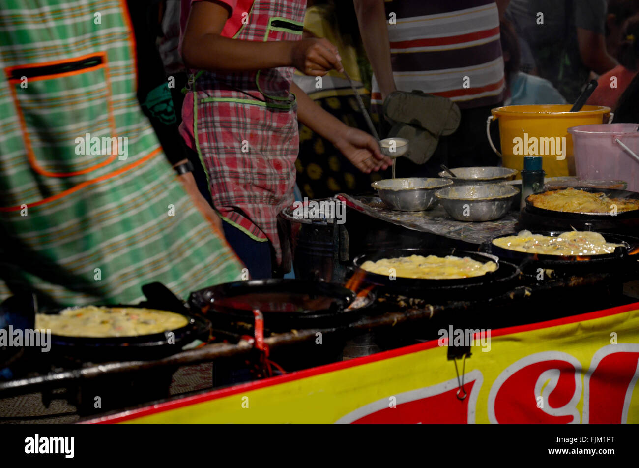 Thai people cooking Fried mussel with egg and crispy flour or Oyster ...