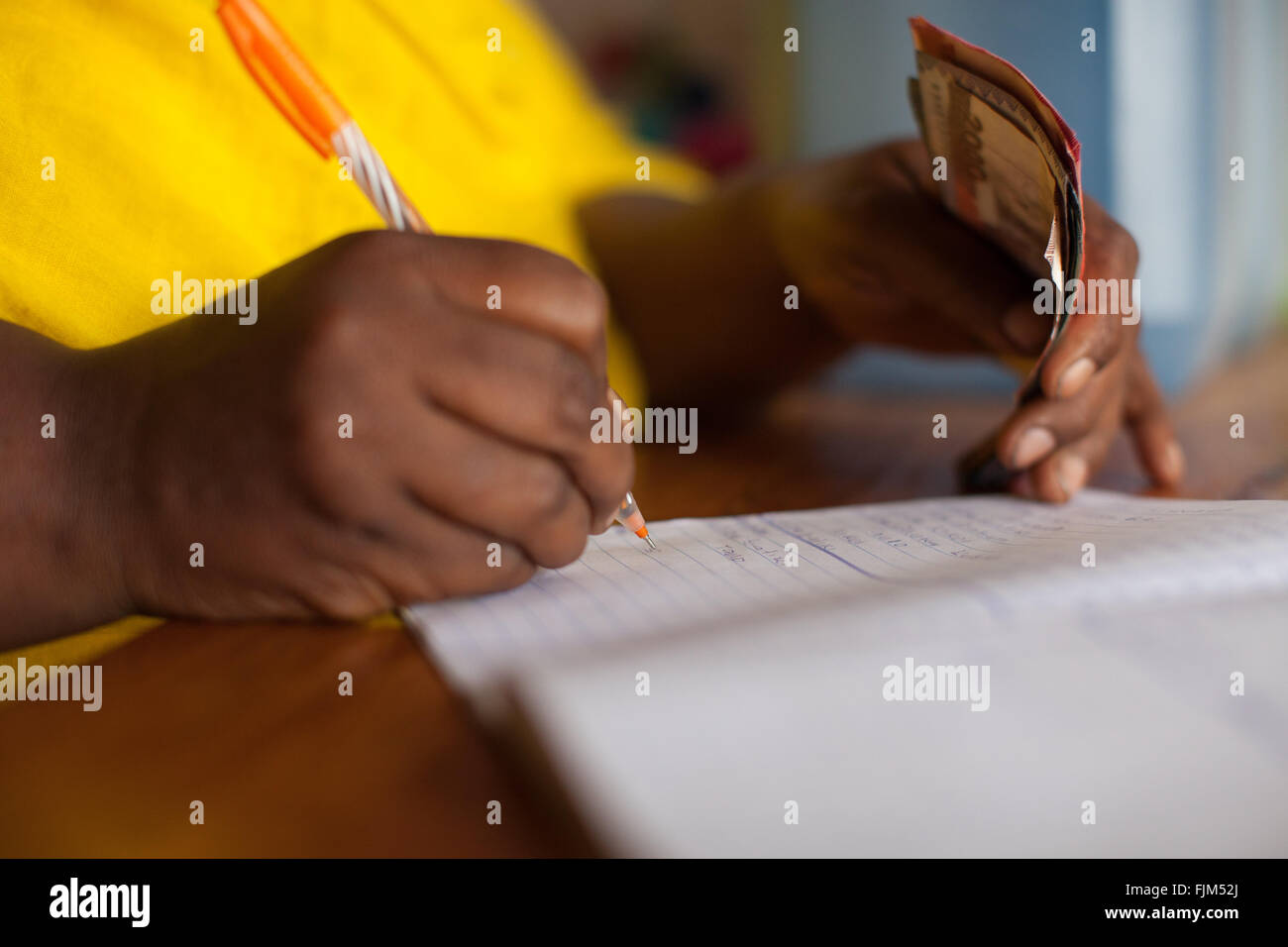 Woman taking notes hi-res stock photography and images - Alamy